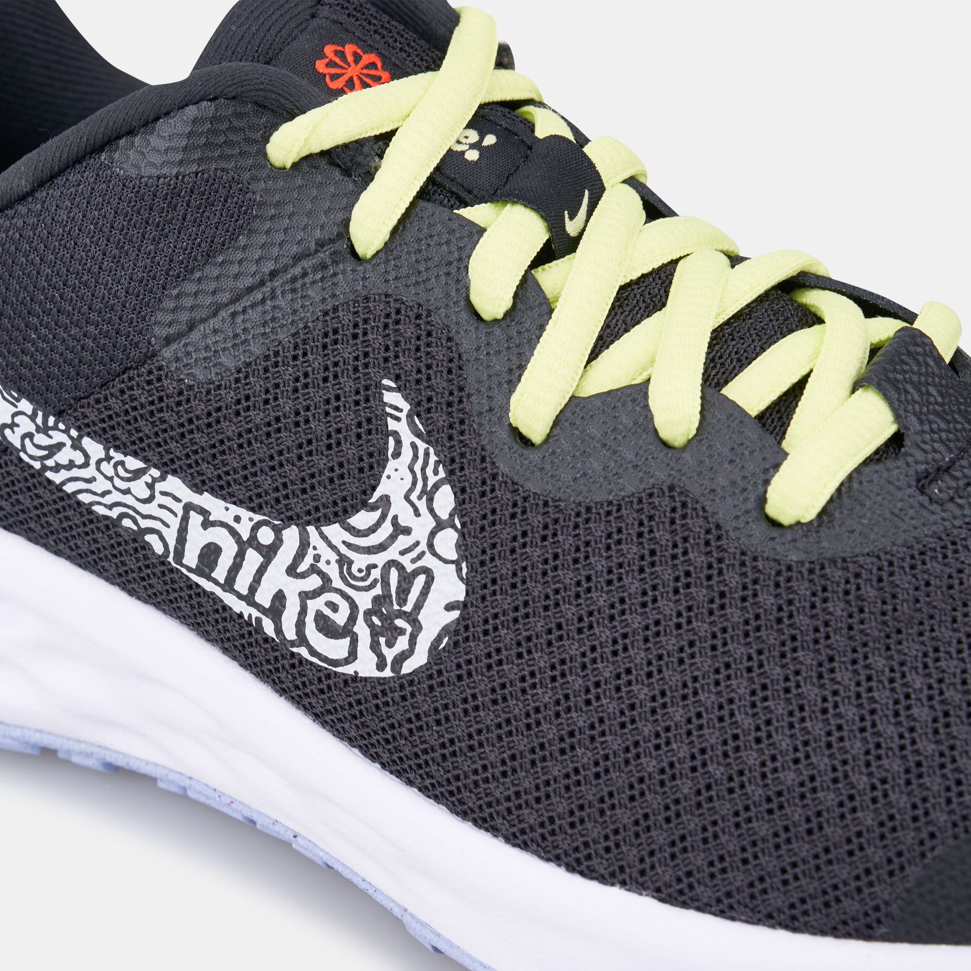 Buy Nike Kids' Revolution 6 NN JP Road Running Shoe (Older Kids) Black in KSA -SSS